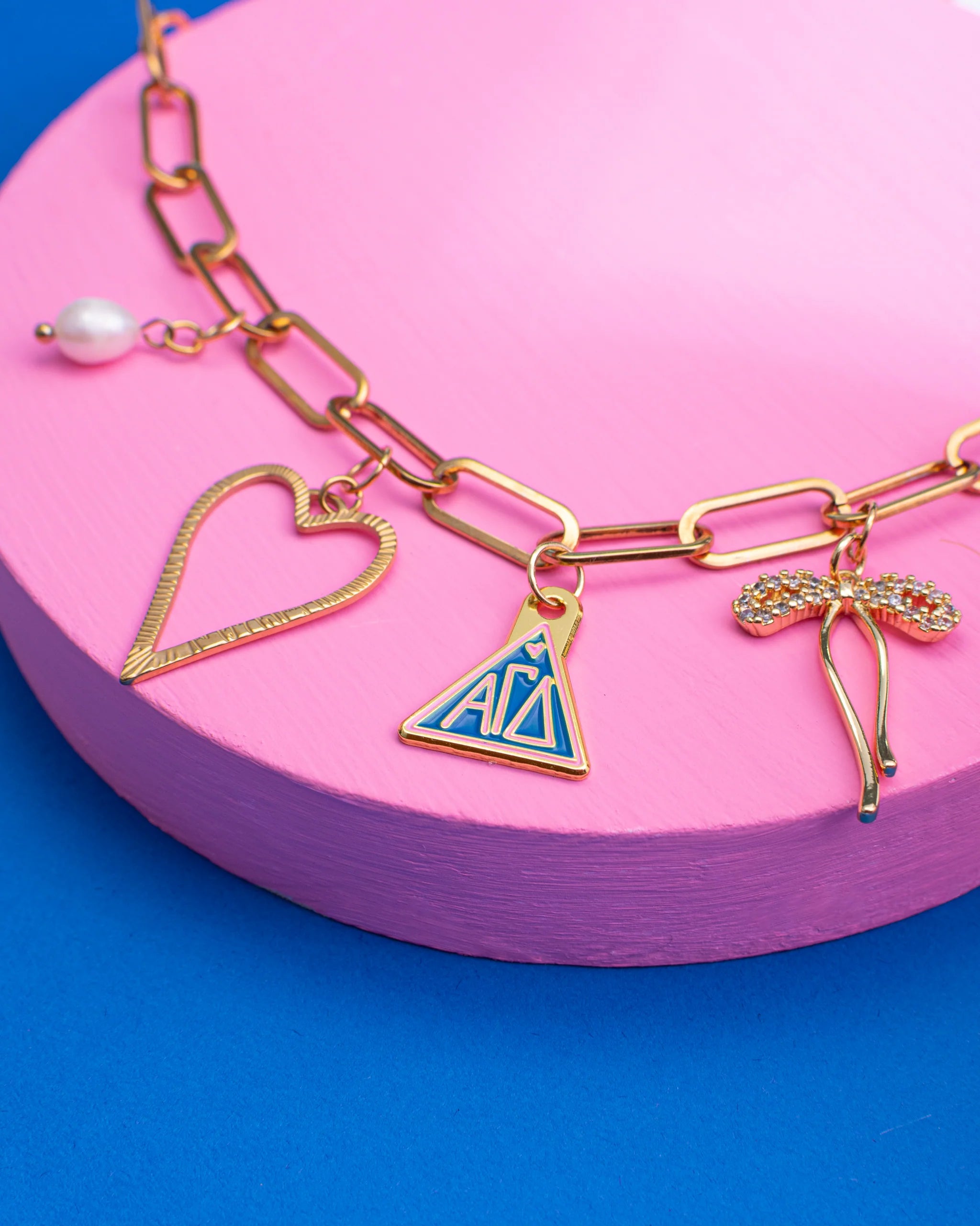 Alpha Gamma Delta Charm – Pop & Pour Party Co